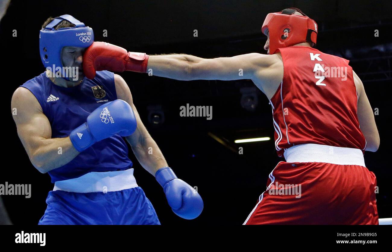 Kazakhstan's Ivan Dychko, right, fights Germany's Erik Pfeifer during a super heavyweight over ...
