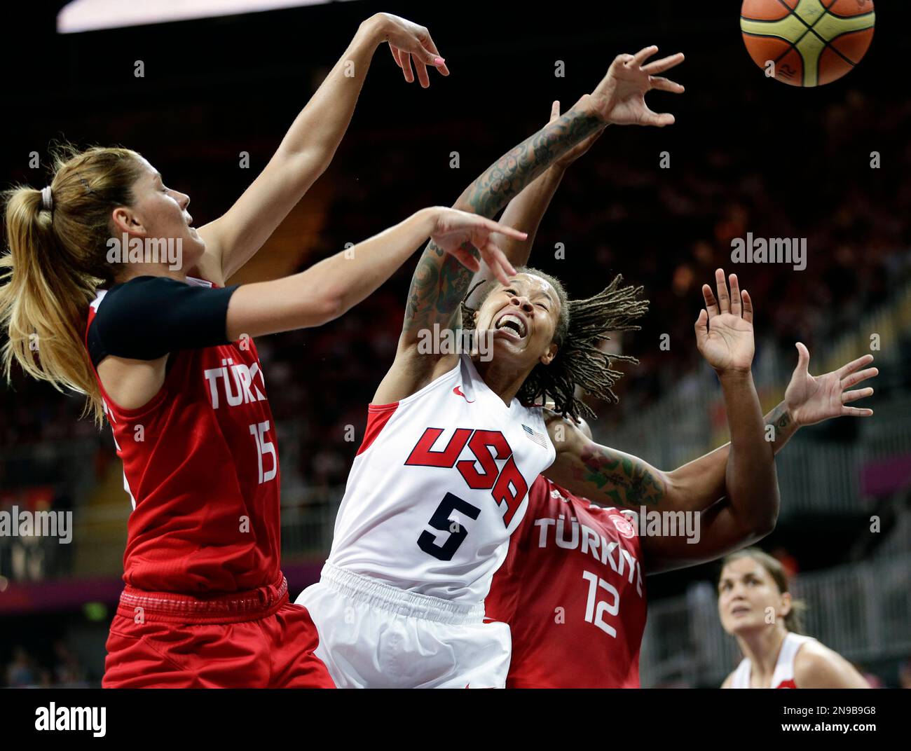 USA's Seimone Augustus (5) is defended by Turkey's Bahar Caglar (15 ...