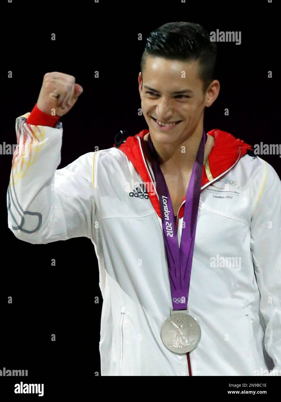 German gymnast and silver medallist Marcel Nyugen celebrates as he ...