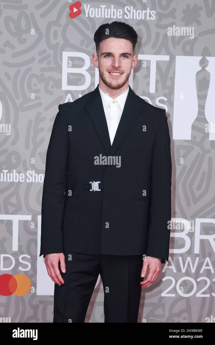 Declan Rice poses for photographers upon arrival at the Brit Awards ...