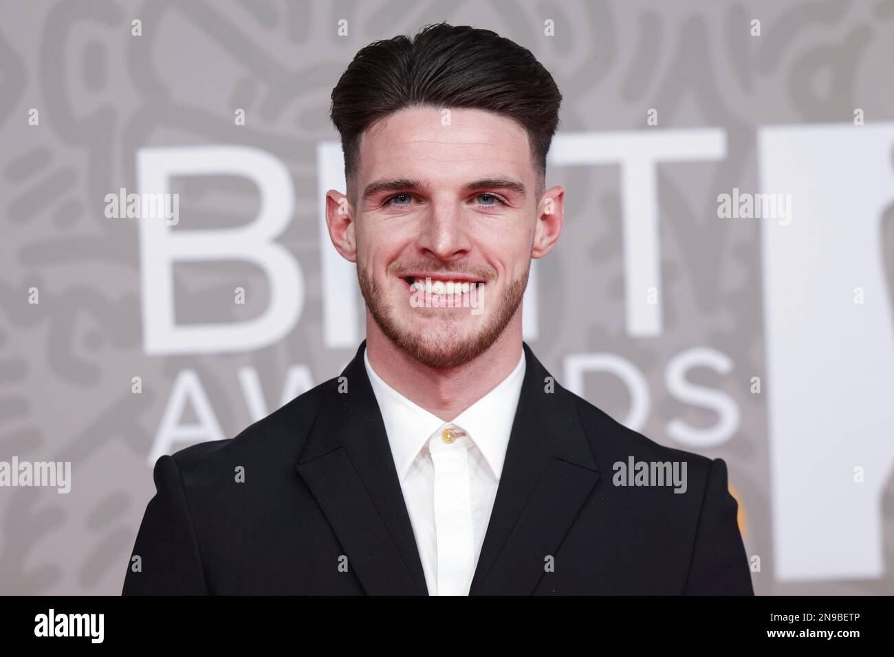 Declan Rice poses for photographers upon arrival at the Brit Awards ...