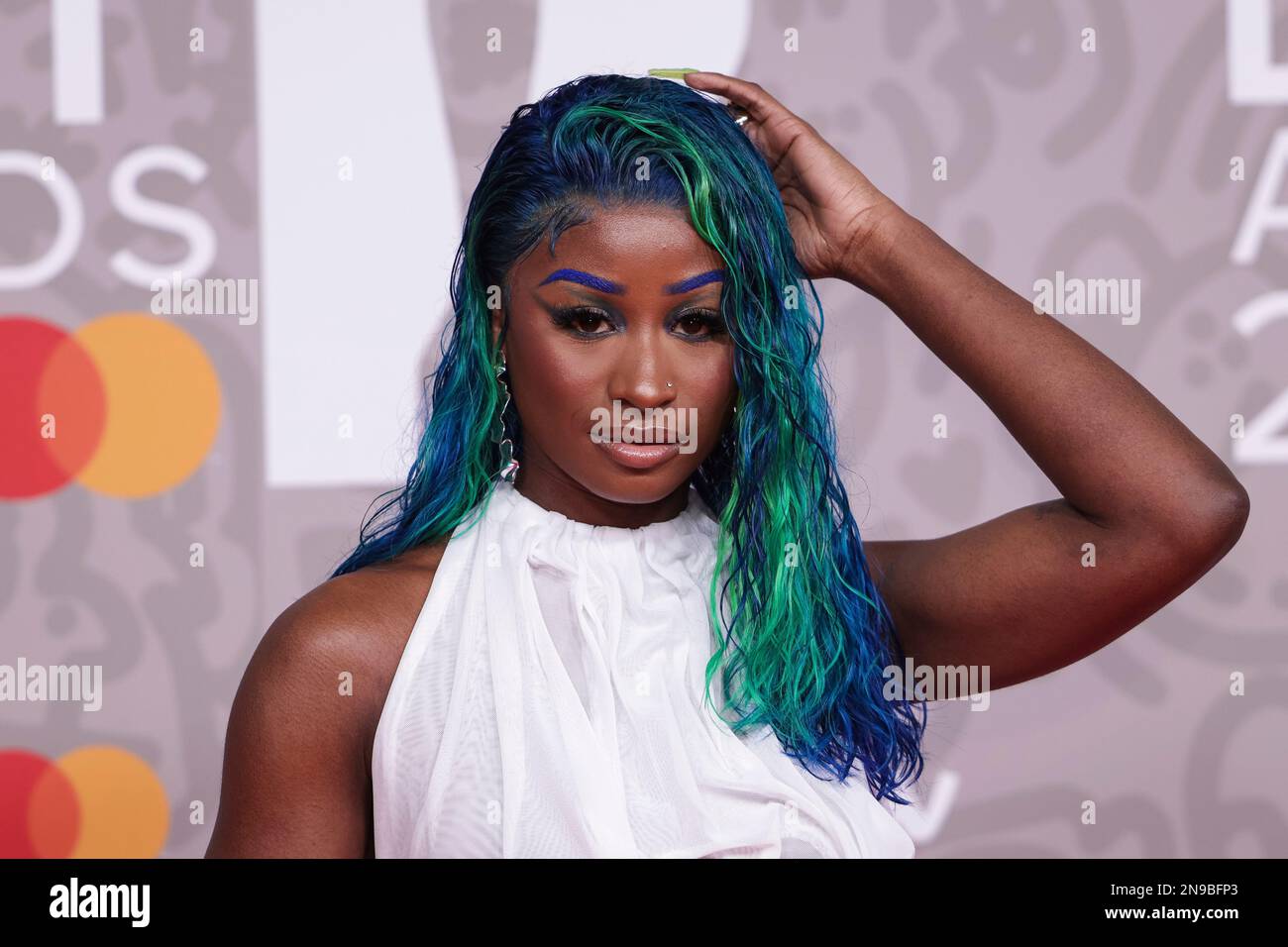 Nife poses for photographers upon arrival at the Brit Awards 2023 in ...