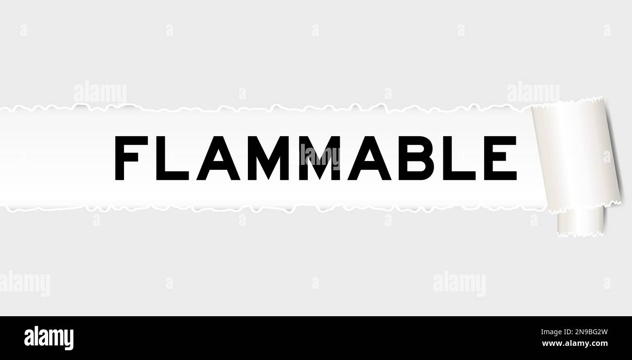Ripped gray paper background that have word flammable under torn part ...