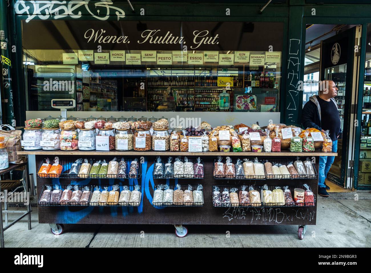 Vienna, Austria - October 14, 2022: Vendor in its nuts, candied fruit ...