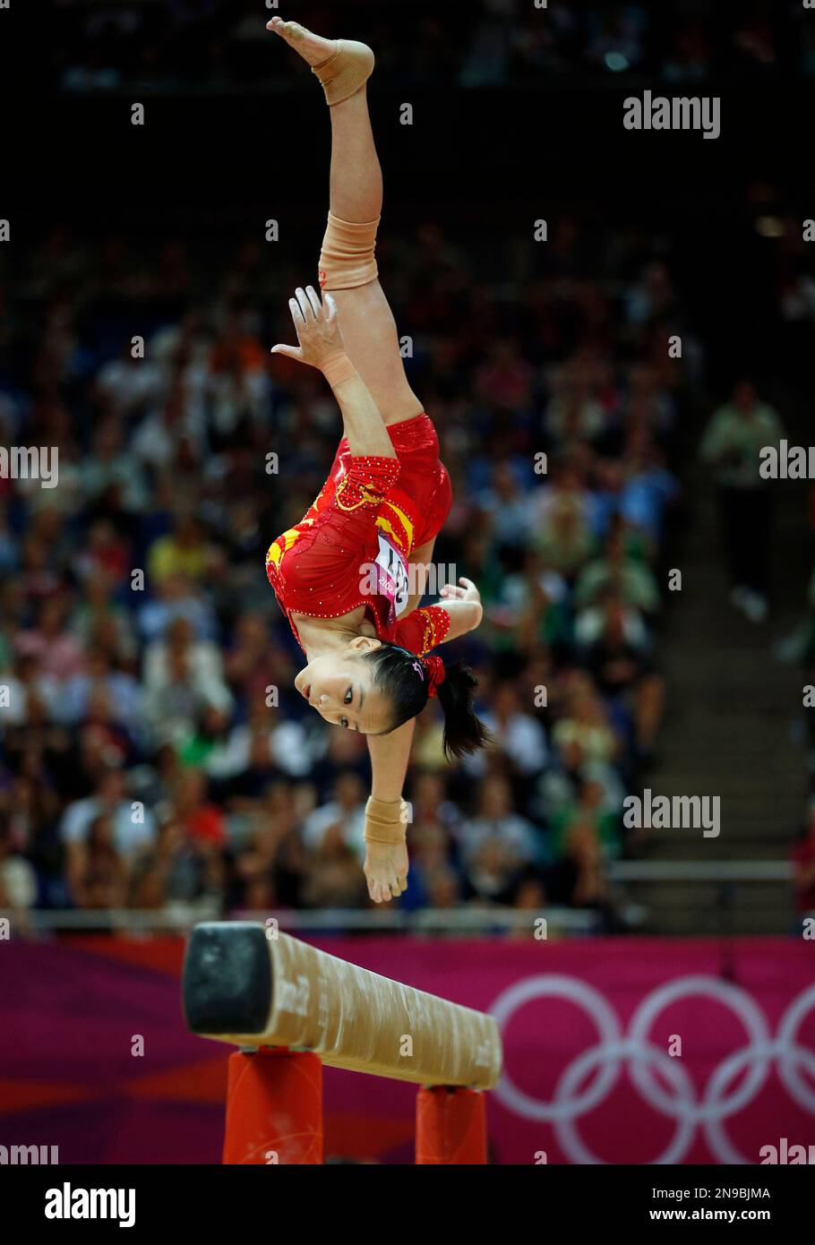 Chinese gymnast Deng Linlin performs on the balance beam during the ...