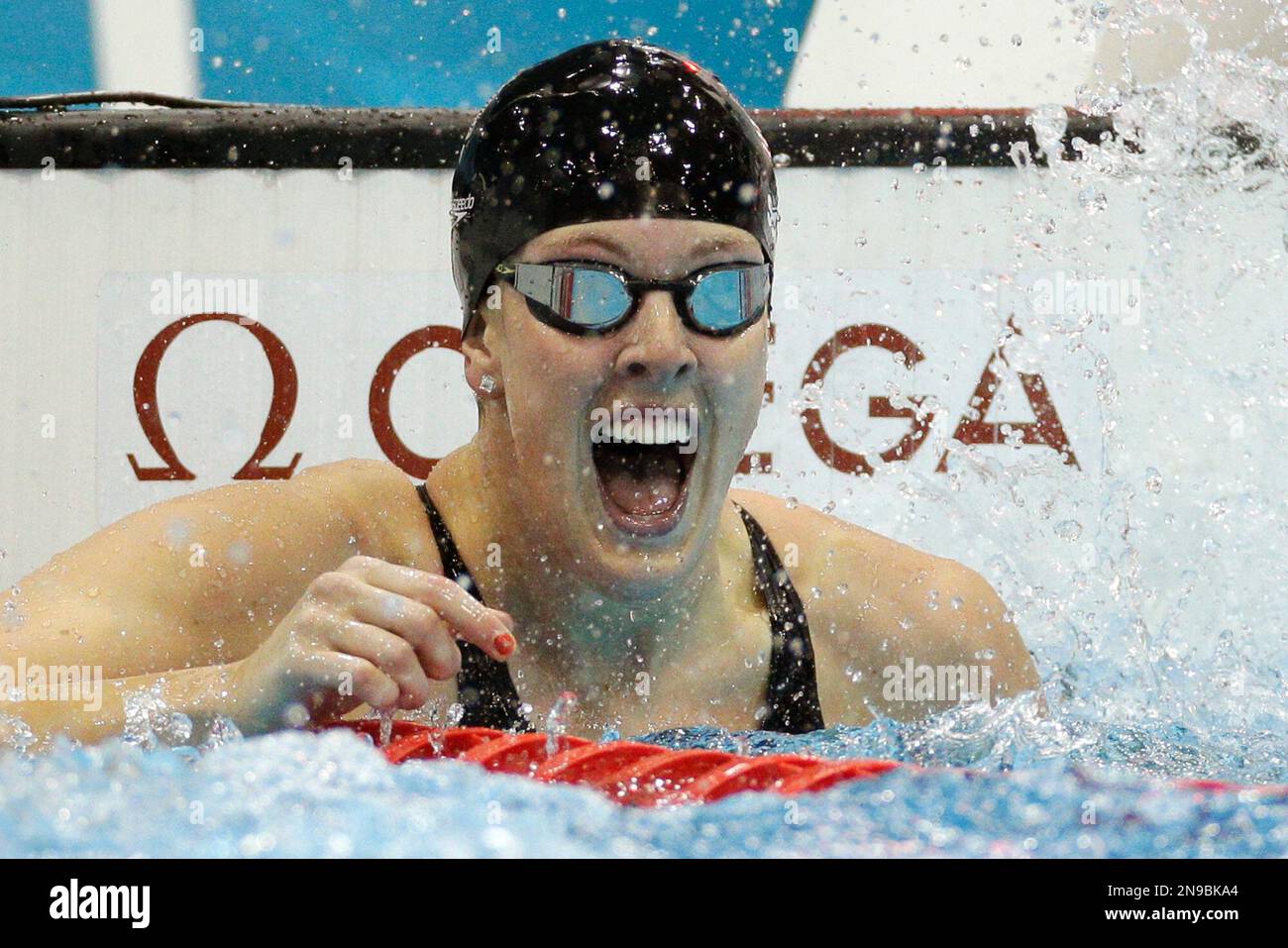 United States' Allison Schmitt reacts as she wins gold in the women's ...