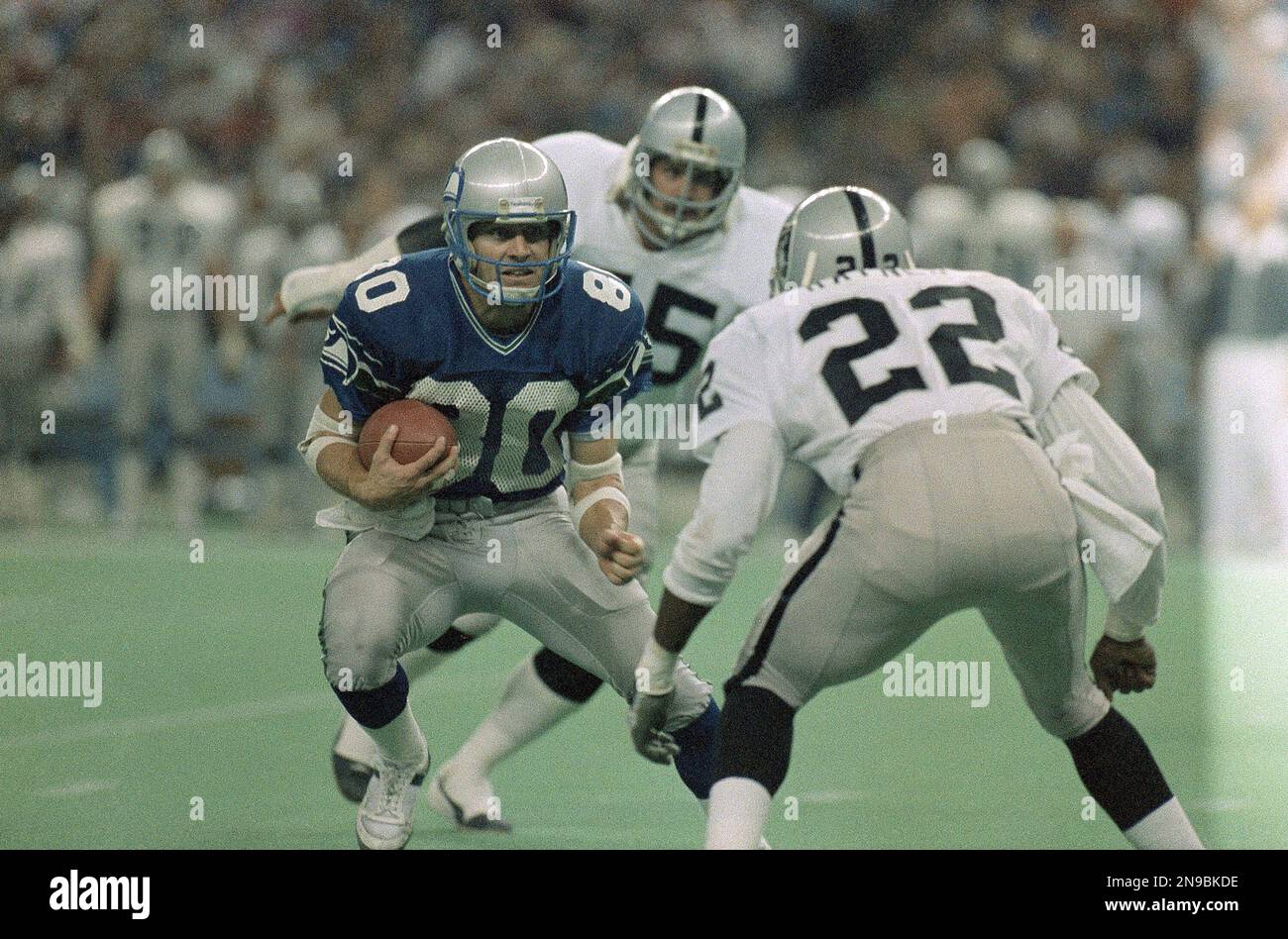 Seattle Seahawks receiver Steve Largent (80) takes in a Dave Krieg pass ...