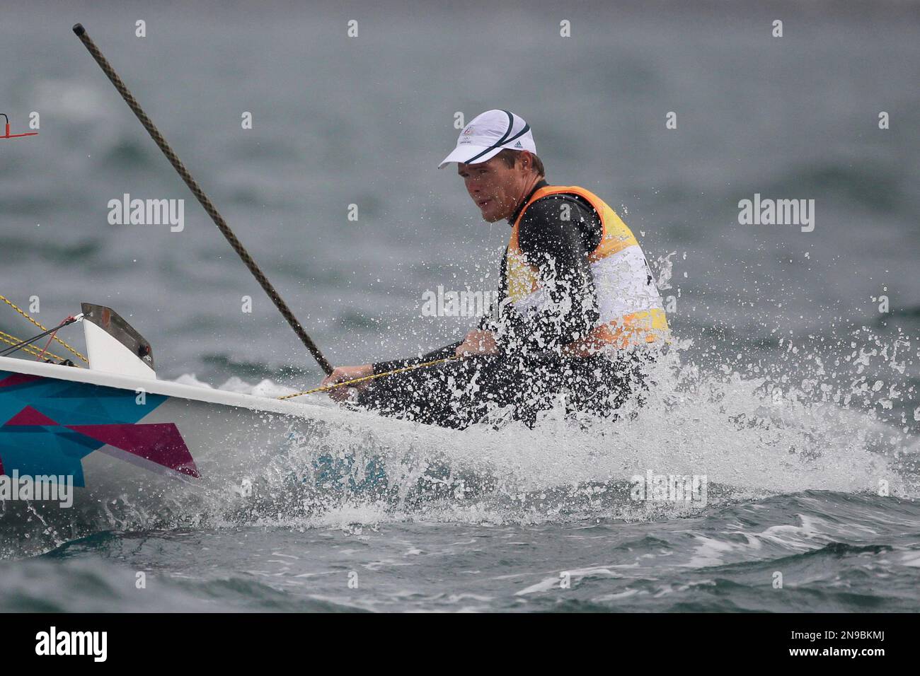 Tom Slingsby of Australia sails on Laser dinghy during the race 3 at ...