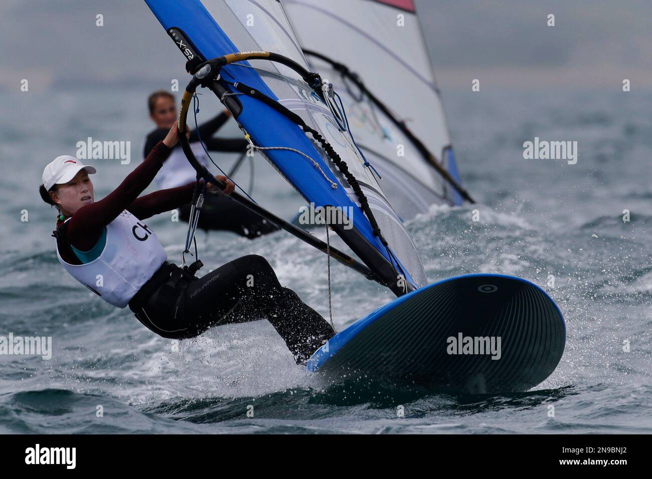 China's Li Ling competes during the rs:x race at the London 2012 Summer ...
