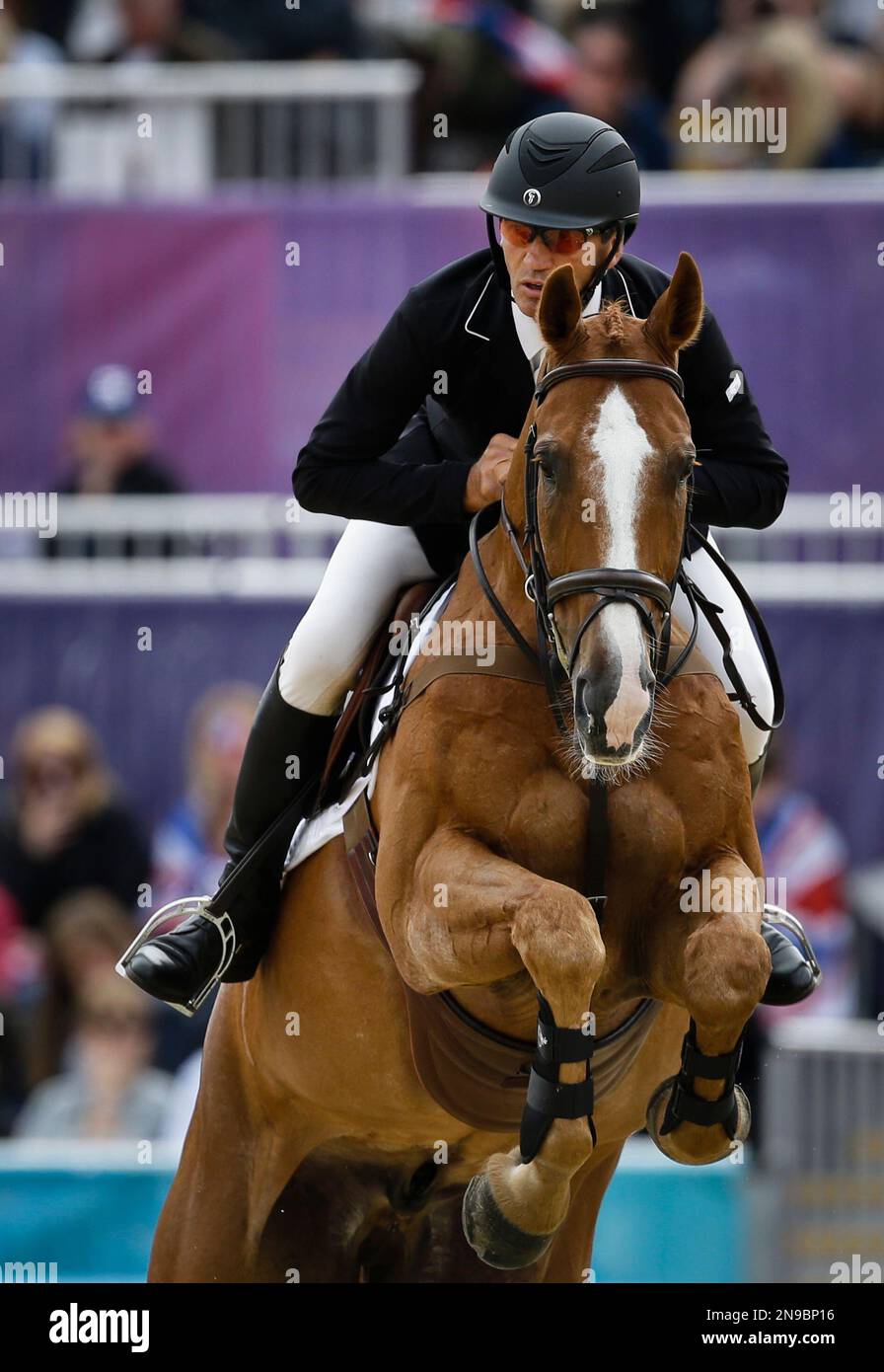Andrew Nicholson of New Zealand riding his horse Nereo competes in the ...