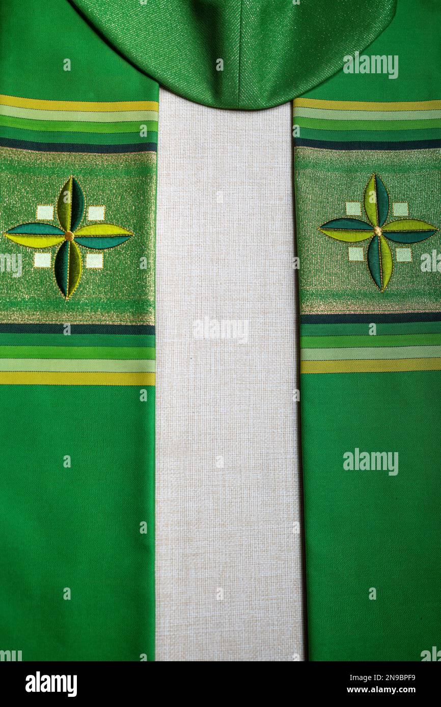 Green liturgical stole of a catholic priest with two crosses Stock ...
