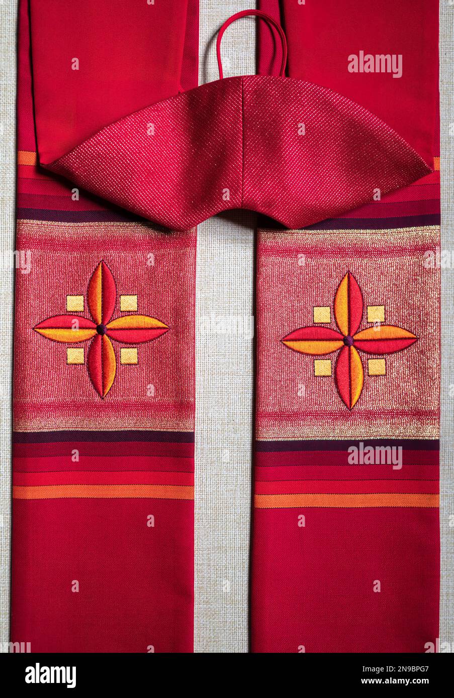 Red liturgical stole of a catholic priest with two crosses Stock Photo ...