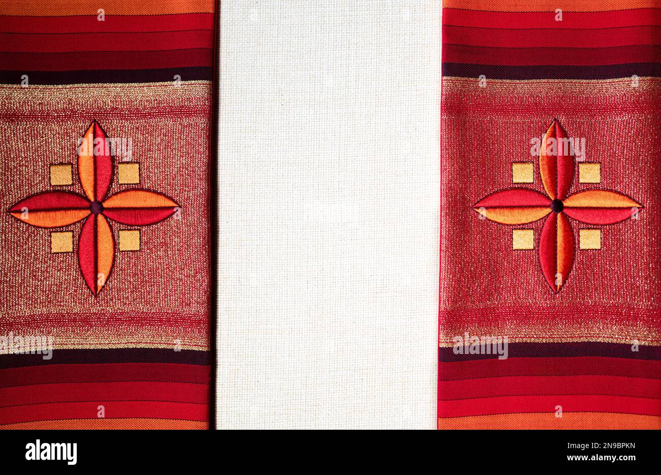 Red liturgical stole of a catholic priest with two crosses Stock Photo ...