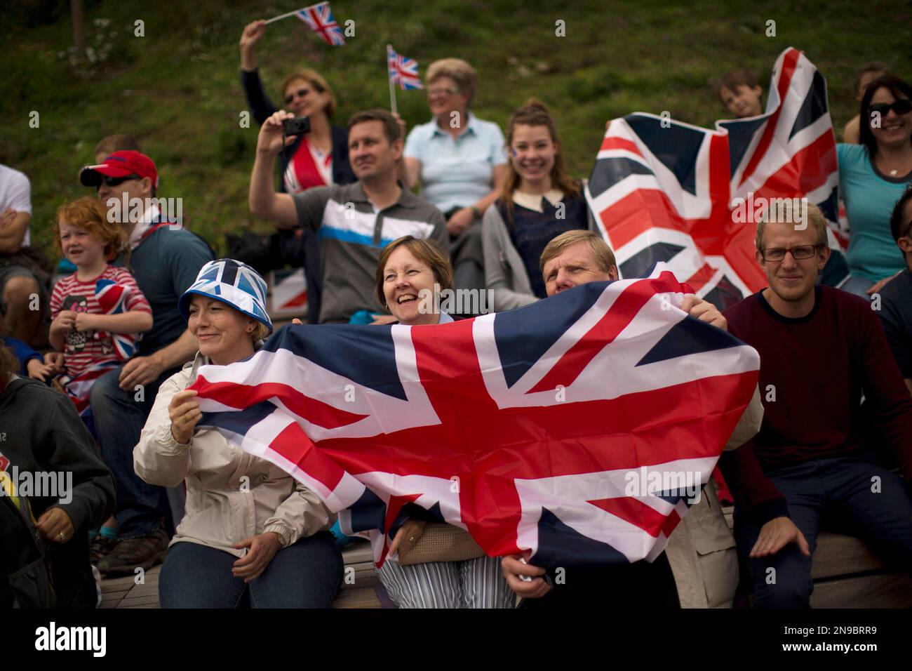 British supporters watch competition on a big screen television at the ...