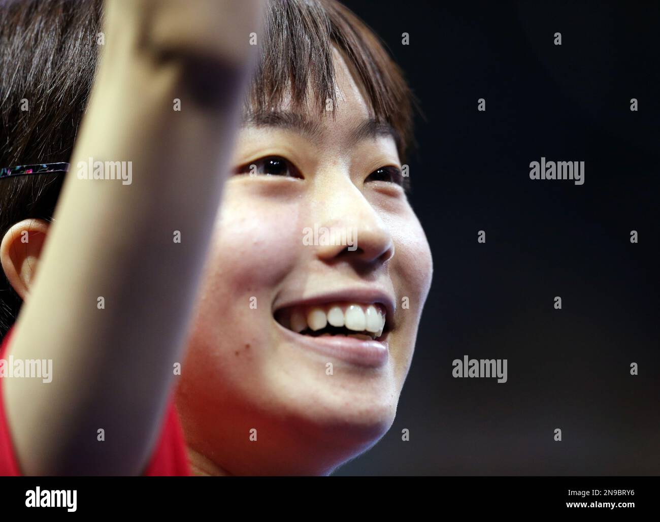 Kasumi Ishikawa of Japan reacts after competing against Yuegu Wang of ...