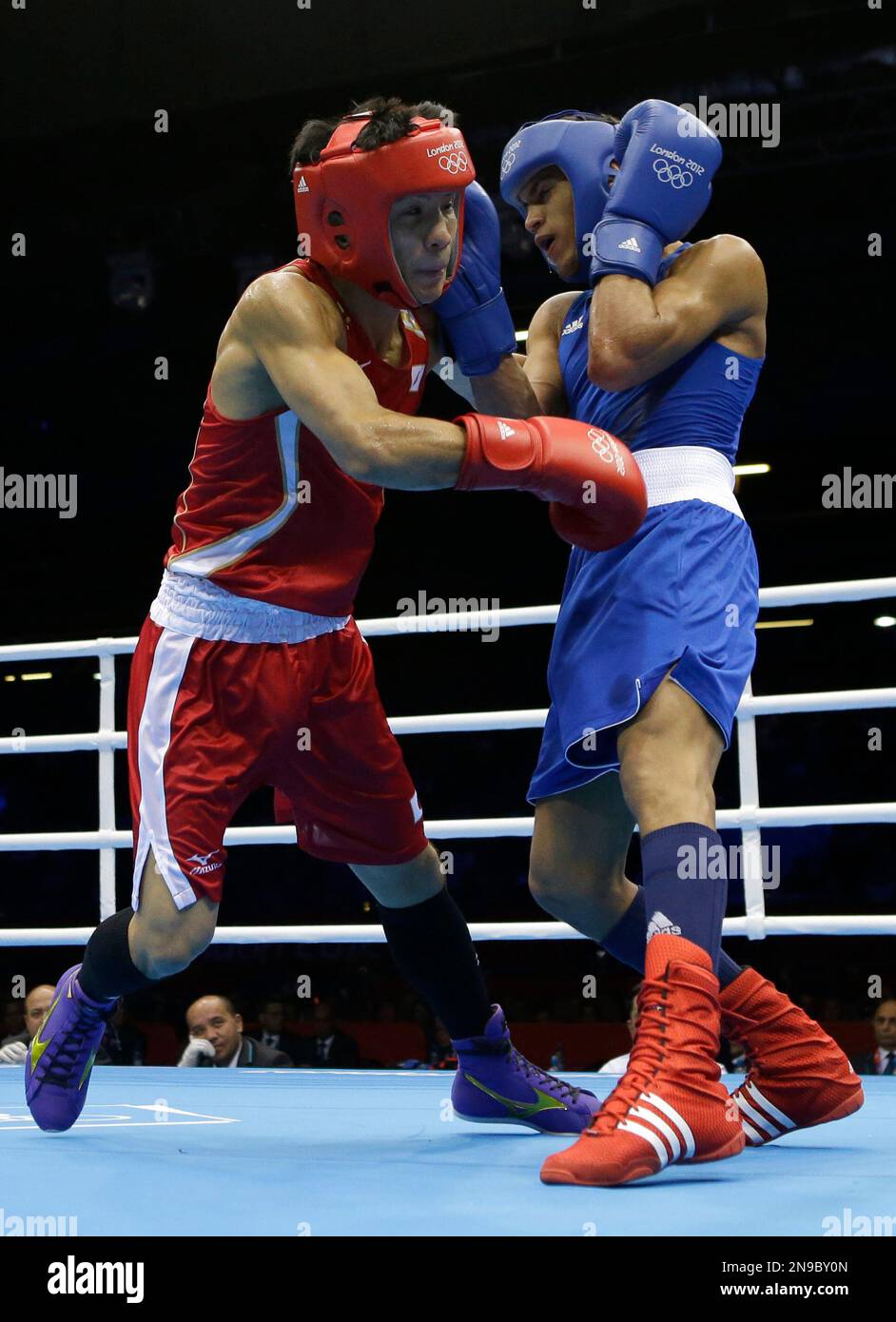 Cuba's Robeisy Ramirez Carrazana fights Japan's Katsuaki Susa during ...