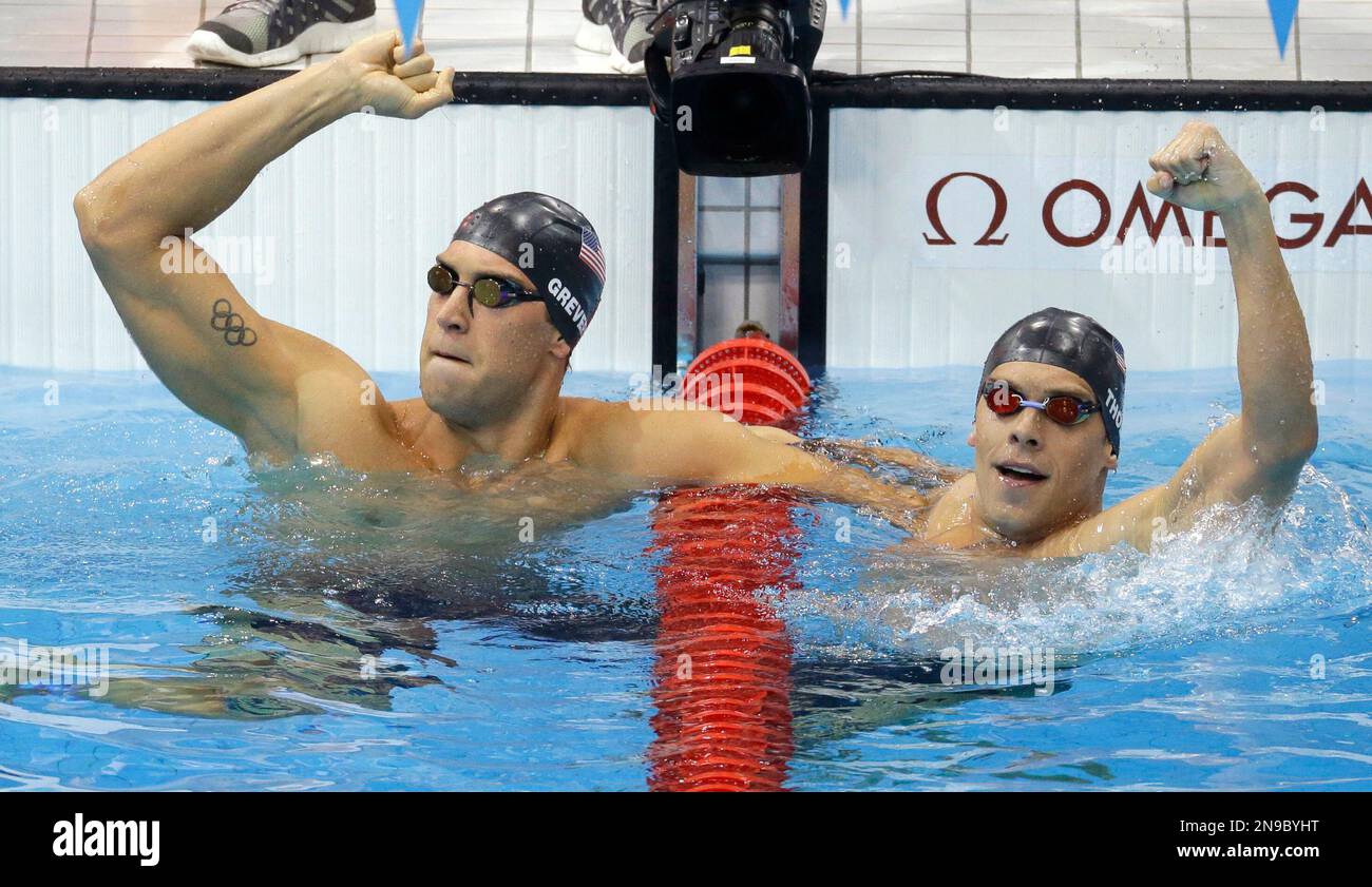 United States gold medalist Matthew Grevers, left, celebrates with ...
