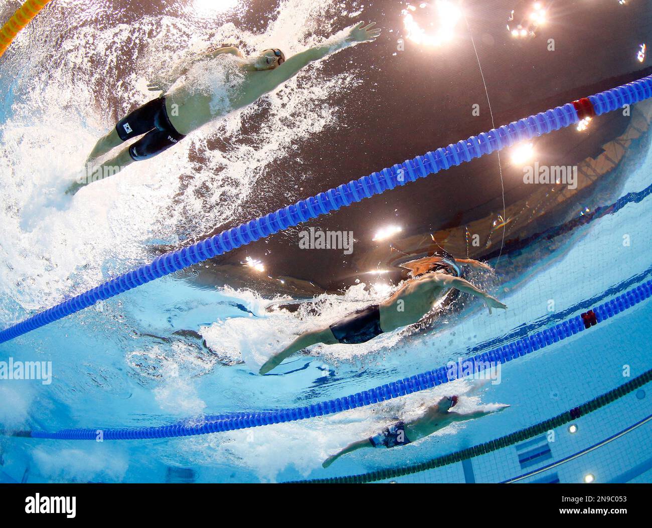 South Korea's Park Tae-hwan, left, United States' Ryan Lochte, center ...