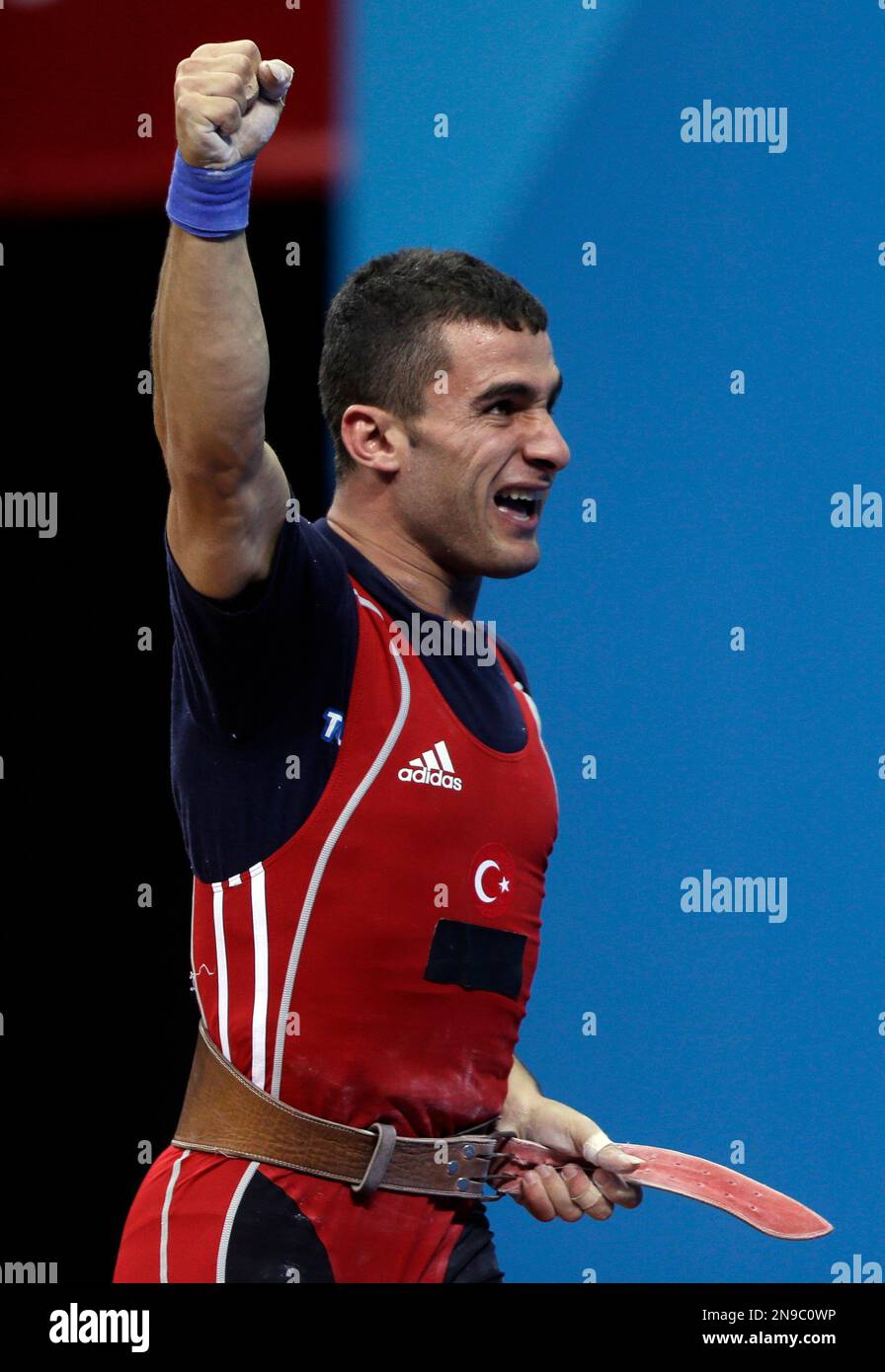 Hursit Atak of Turkey reacts after competing during the men's 62-kg ...