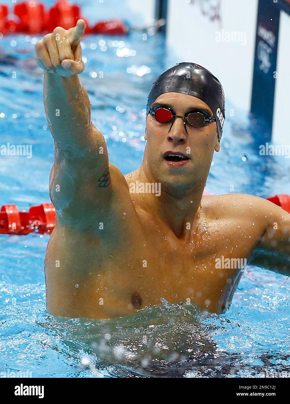 United States' Matthew Grevers celebrates his gold medal win in the men ...