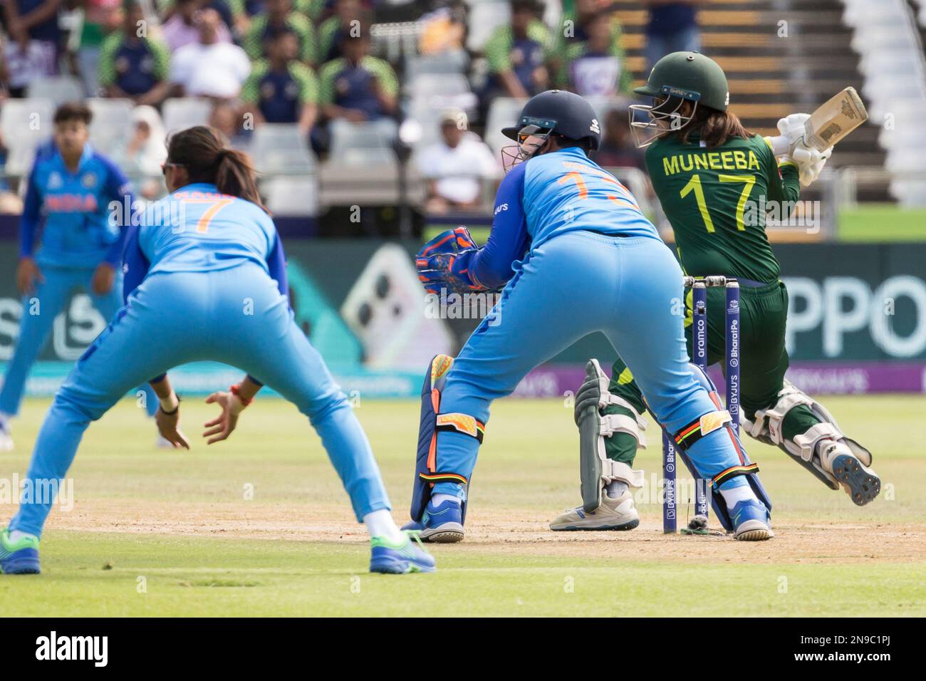 Pakistan's Muneeba Ali Siddiqui, right, while India's wicketkeeper ...