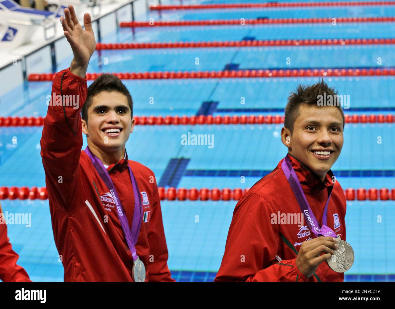 Silver medalist German Sanchez Sanchez, right, and Ivan Garcia Navarro ...