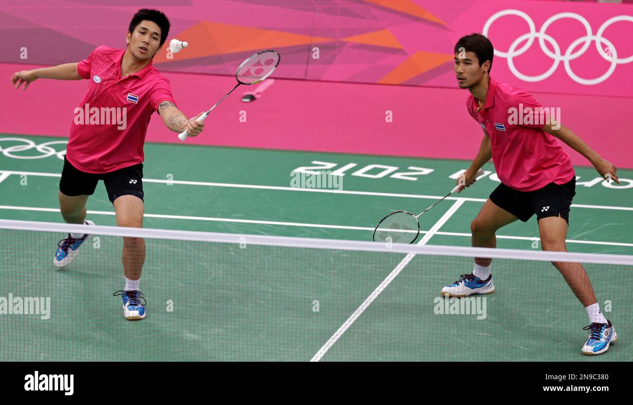 Thailand's Bodin Isara, left, and Maneepong Jongjit play against Adam ...