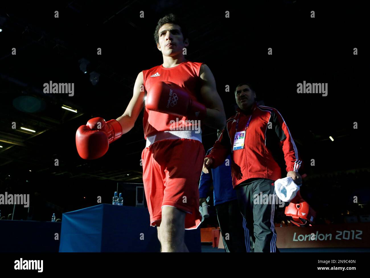 Egypt's Hesham Abdelaal makes his way to the ring before fighting Kenya ... Egypt's Hesham Abdelaal makes his way to the ring before fighting Kenya ...