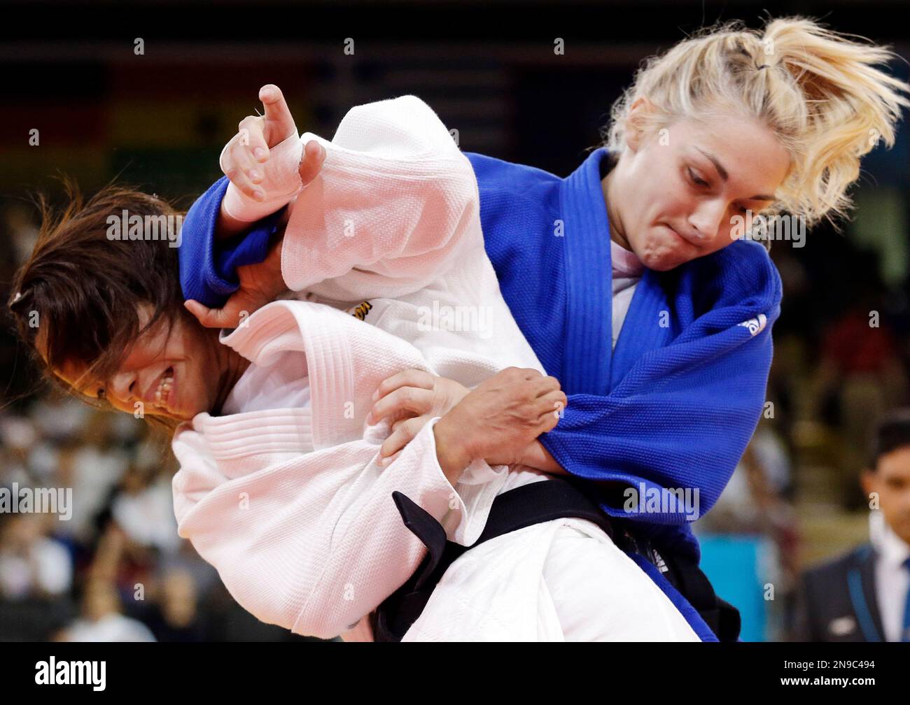 Kaori Matsumoto of Japan, left, and Automne Pavia of France conpete ...
