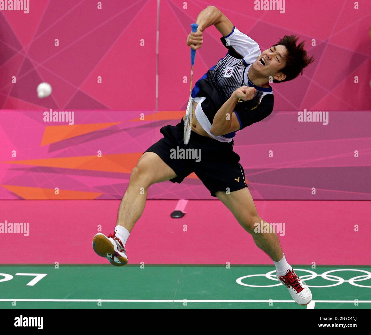 South Korea's Lee Yong-dae plays with teammate Ha Jung-eun against ...