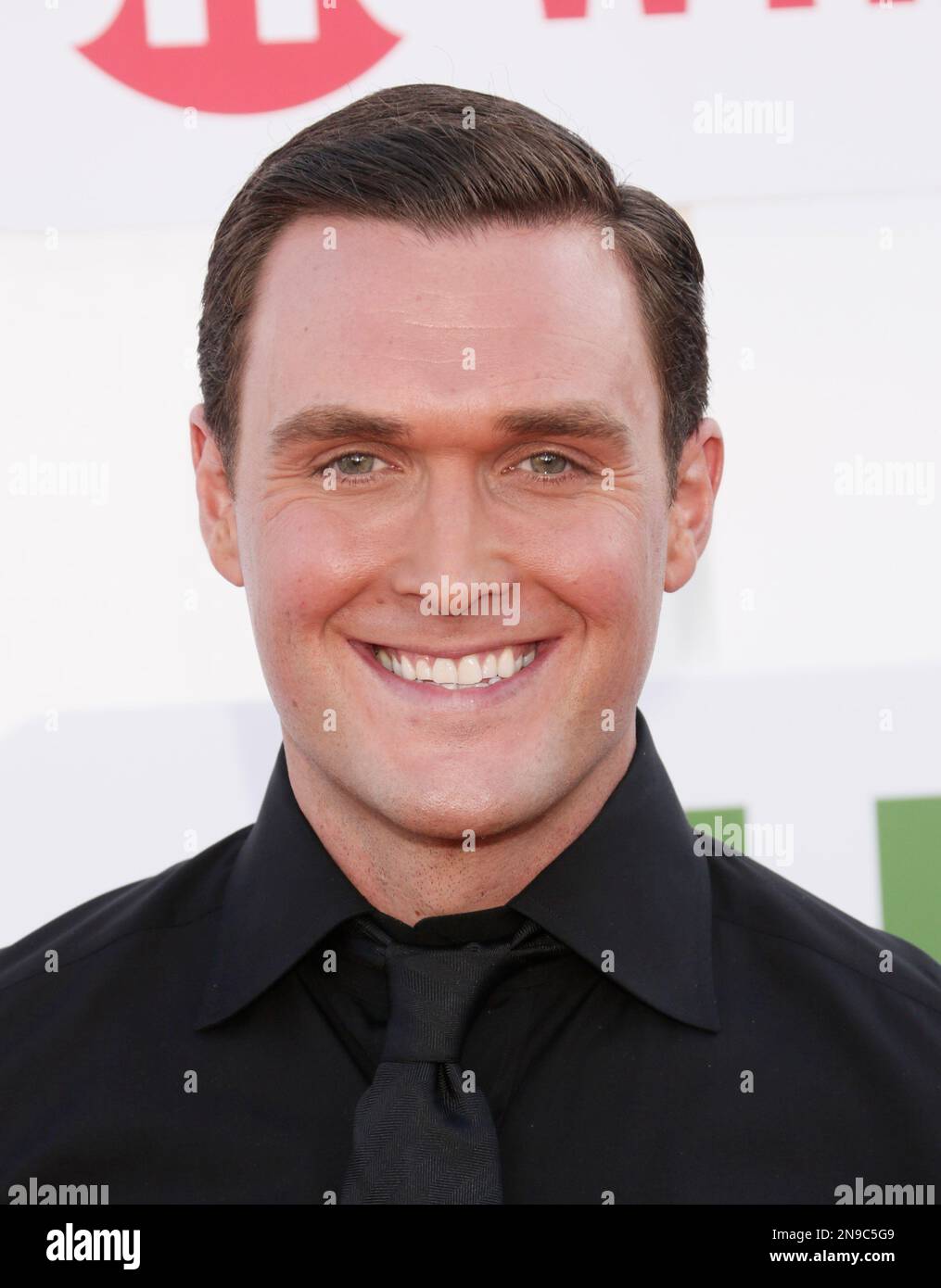 Owain Yeoman attends the CBS, Showtime and The CW 2012 TCA summer tour ...