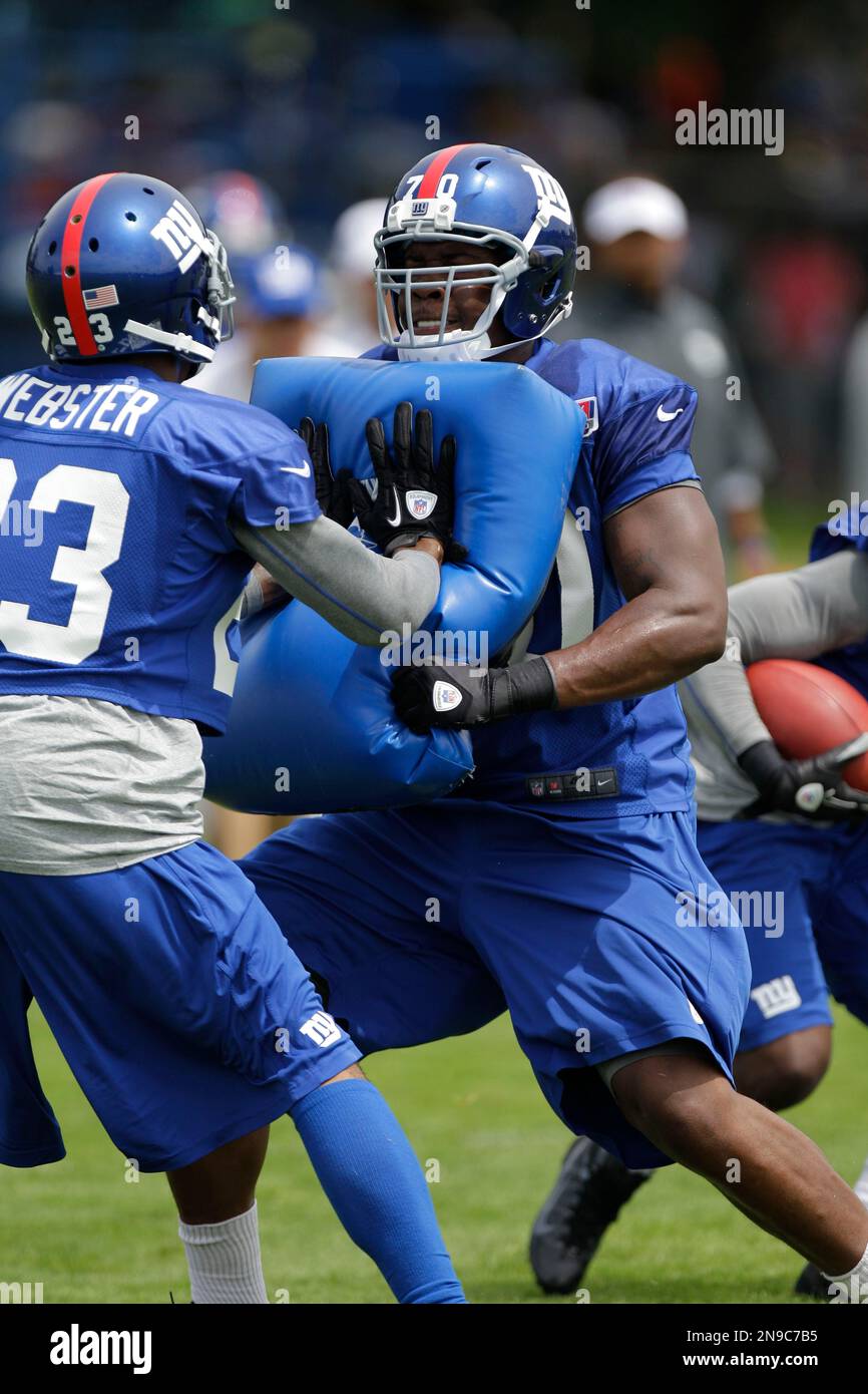 New York Giants cornerback Corey Webster (23) and Giants defensive end ...
