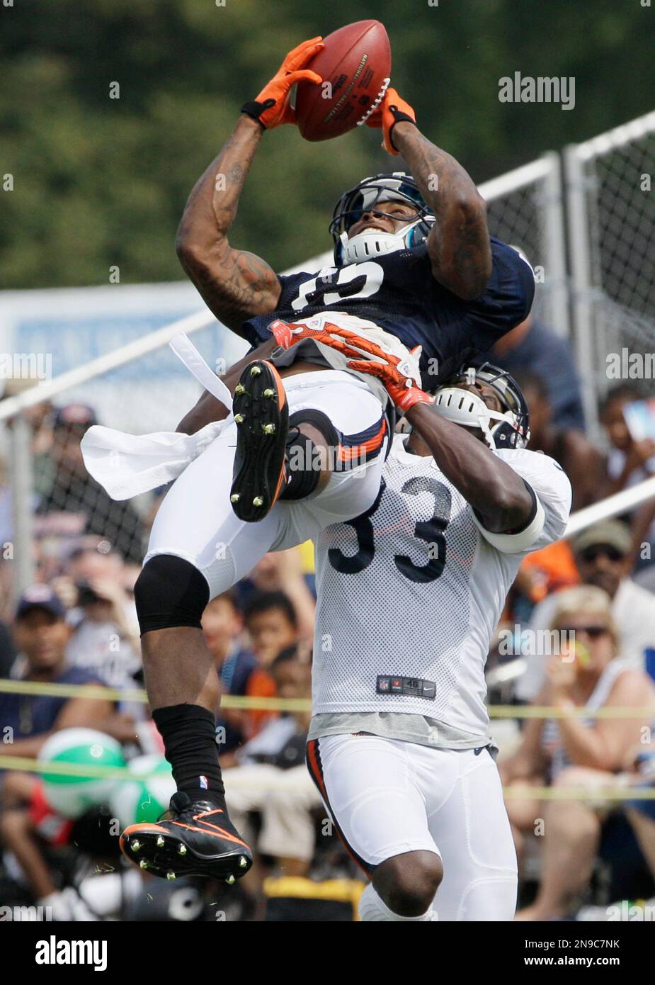 Chicago Bears wide receiver Brandon Marshall, top, catches a ball ...