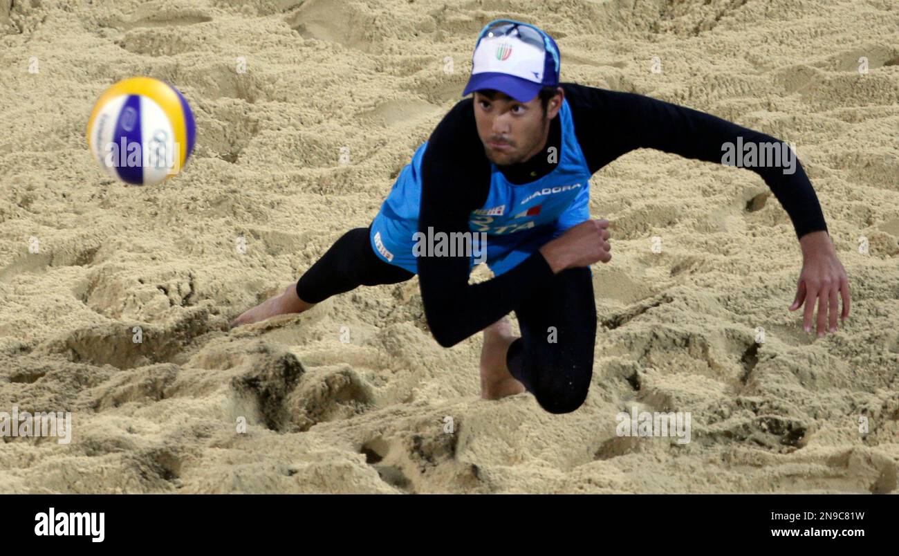 Daniele Lupo of Italy dives for the ball during a beach volleyball ...