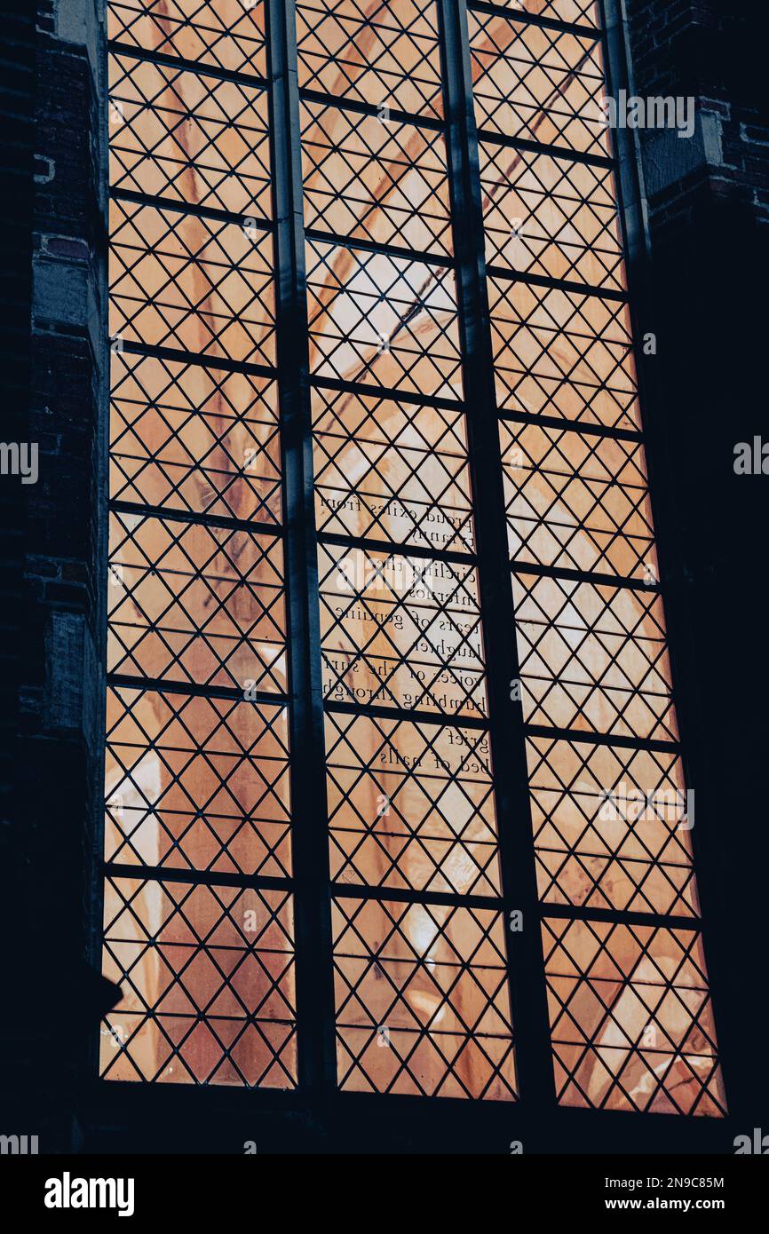 A vertical shot of a triangle-shaped pattern window fence Stock Photo ...