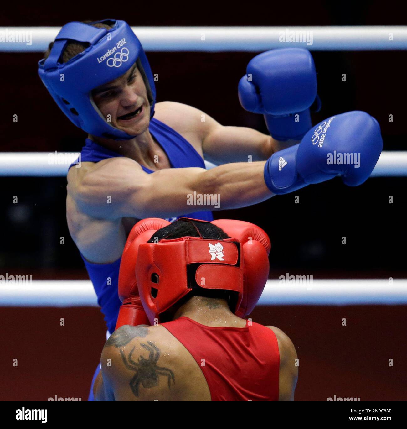 Ecuador's Carlos Sanchez Estacio fights Ireland's Adam Nolan, top ...