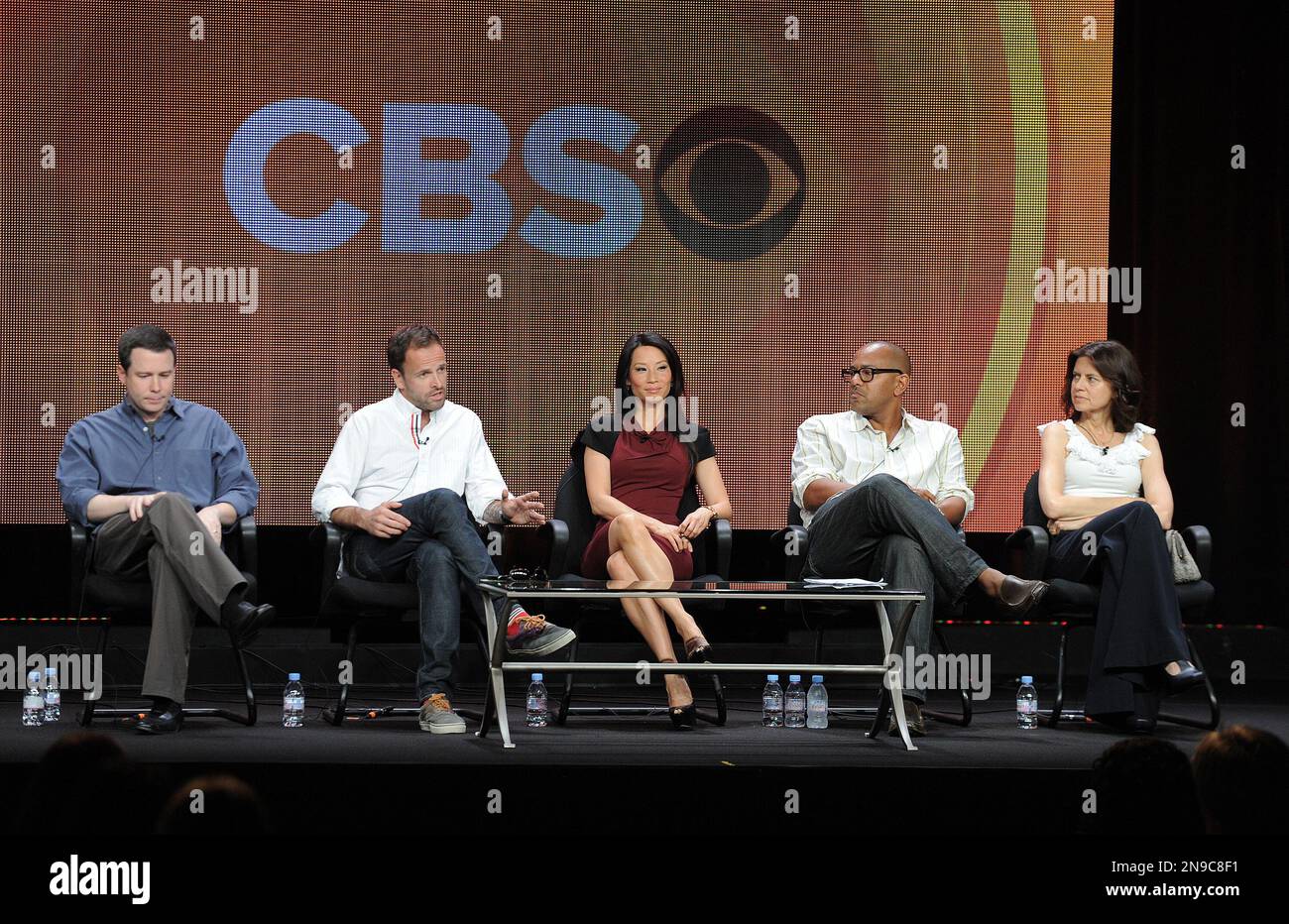 From left, executive producer Robert Doherty, Jonny Lee Miller, Lucy ...