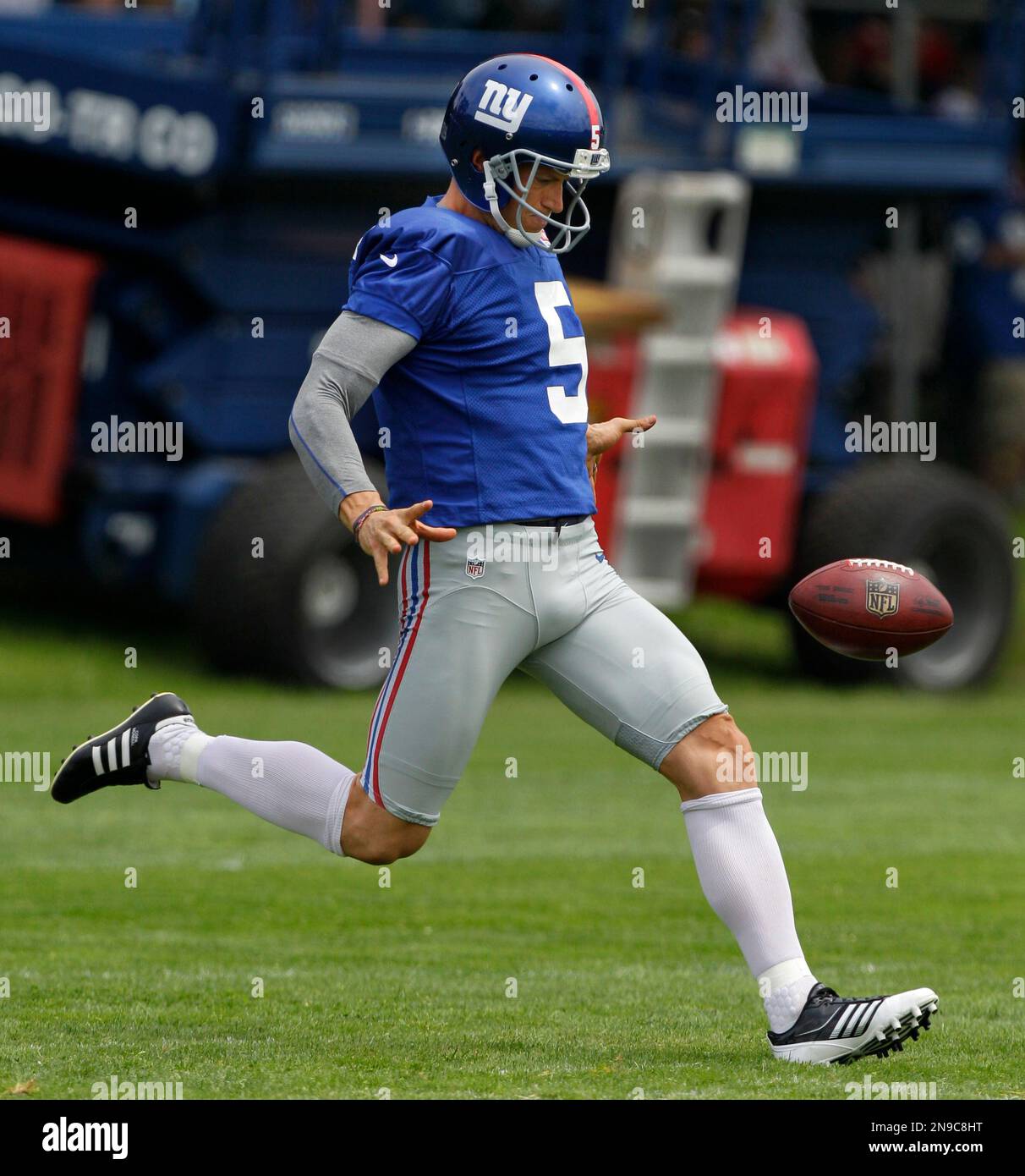 New York Giants Steve Weatherford (5) punts during a workout for ...