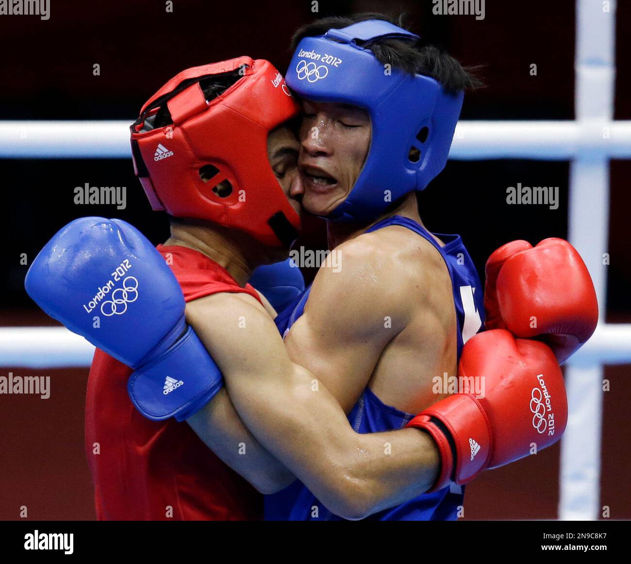 Egypt's Mohamed Eliwa, left, and South Korea's Han Soon-chul fight ...