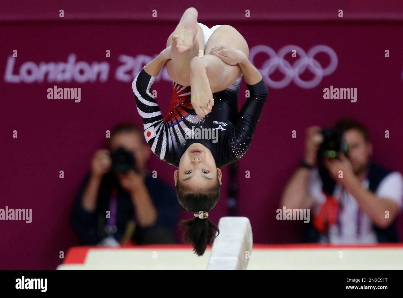 Japanese gymnast Yu Minobe performs on the balance beam during the ...