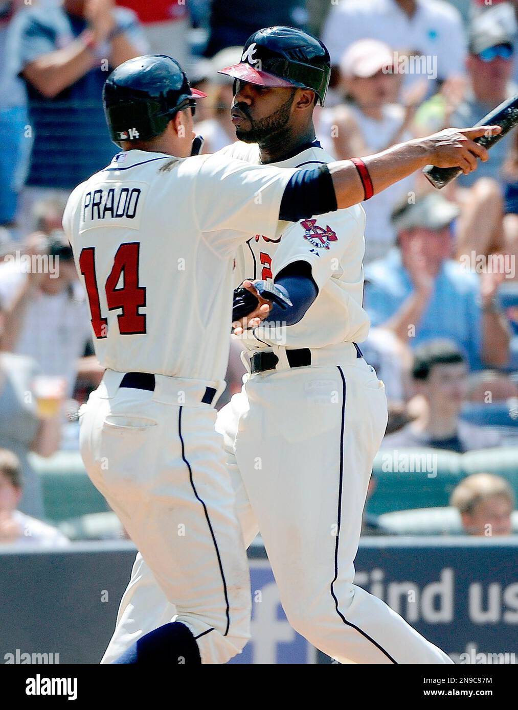 Atlanta Braves' Martin Prado (14) and Jason Heyward celebrate after ...