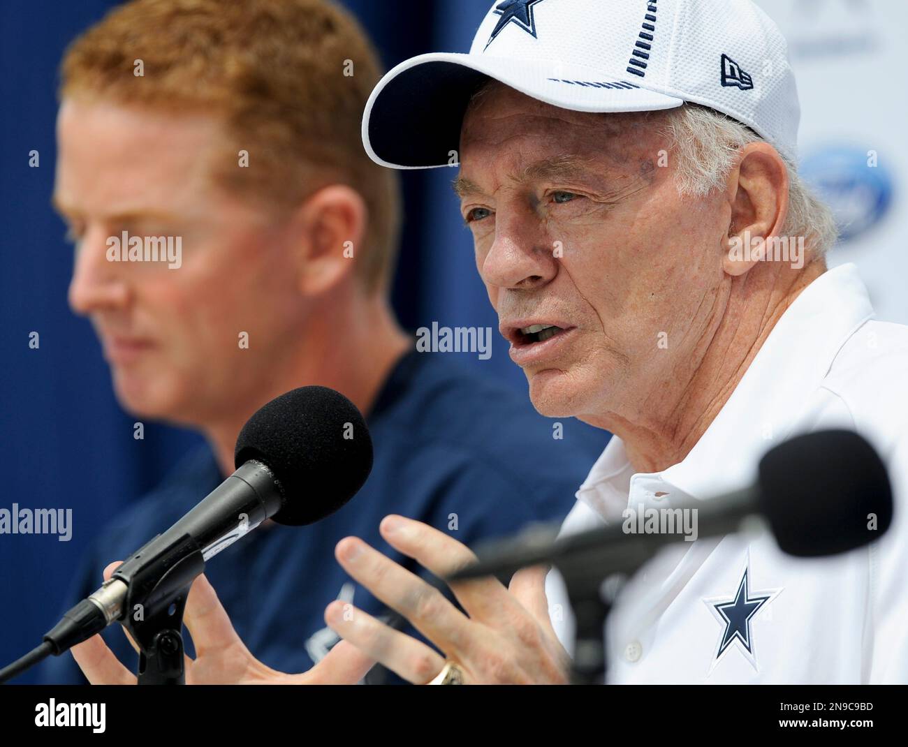 Dallas Cowboys head coach Jason Garrett, left and owner Jerry Jones ...
