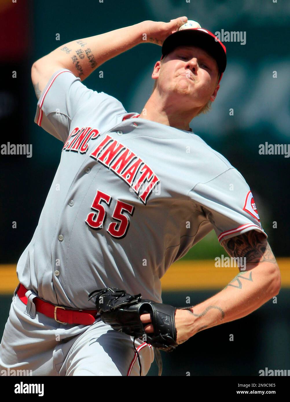 Cincinnati Reds starting pitcher Mat Latos works against the Colorado ...