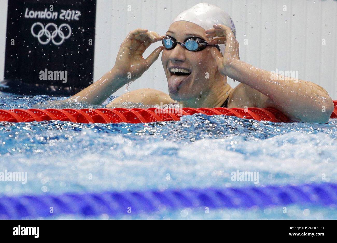 France's Camille Muffat reacts after winning the the women's 400-meter ...