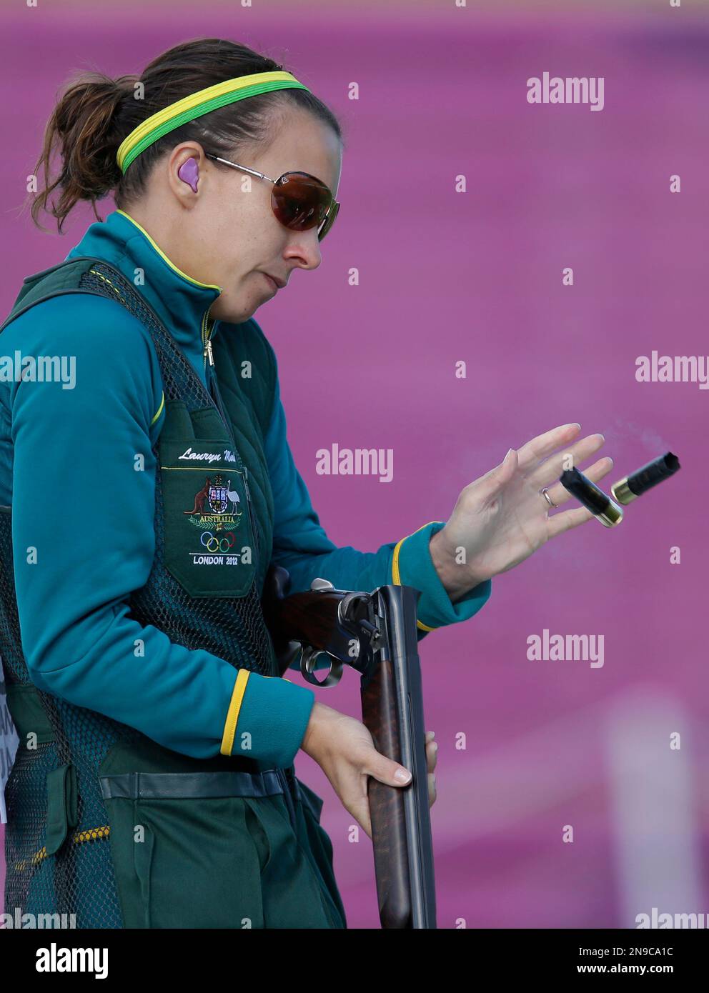 Australia's Lauryn Mark ejects cartridges between shots during the ...