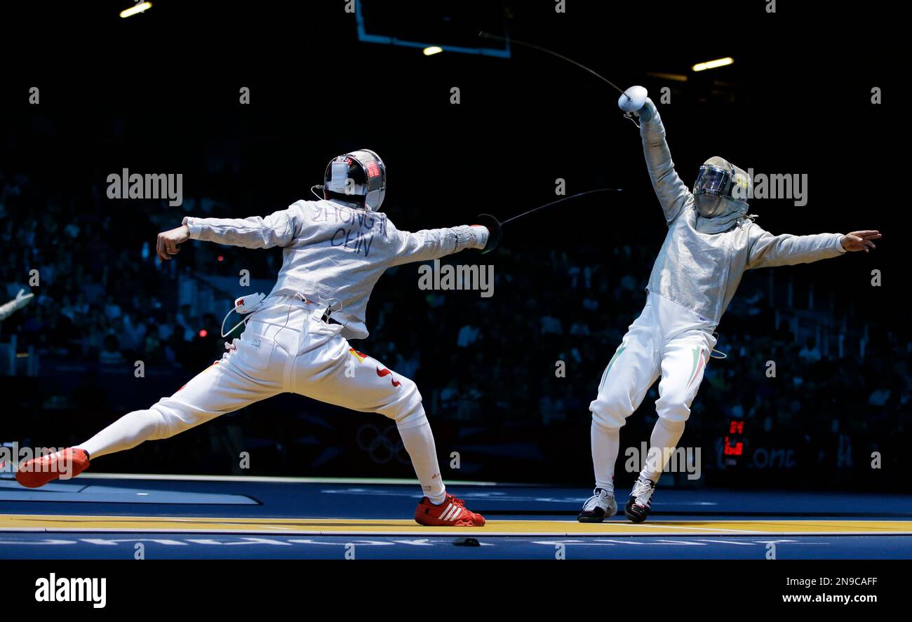 China's Man Zhong and South Korea's Kim Jung-hwan compete during the ...