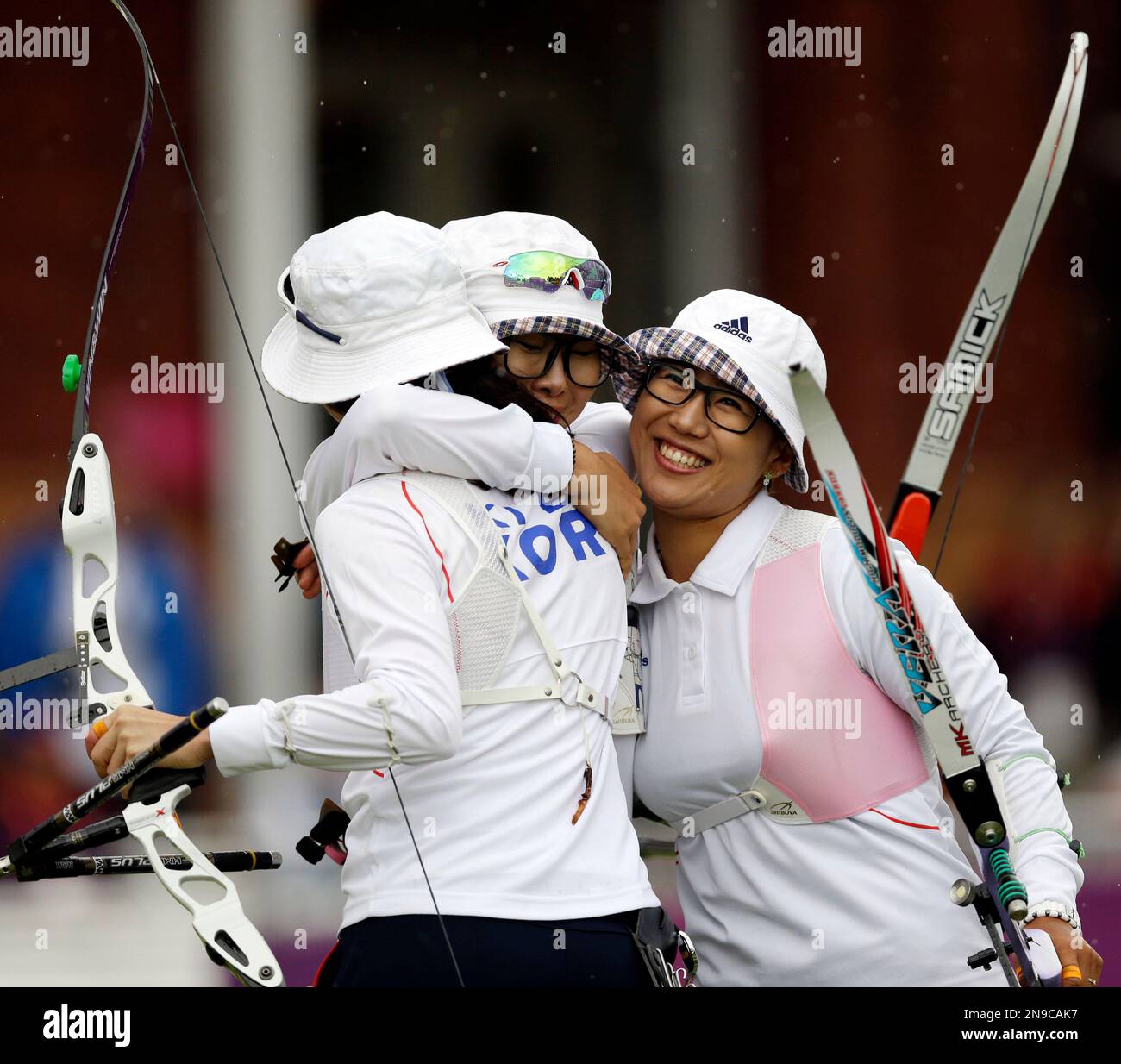 South Korea' s from left, Ki Bo-bae, Lee Sung-jin and Choi Hyeon-ju ...