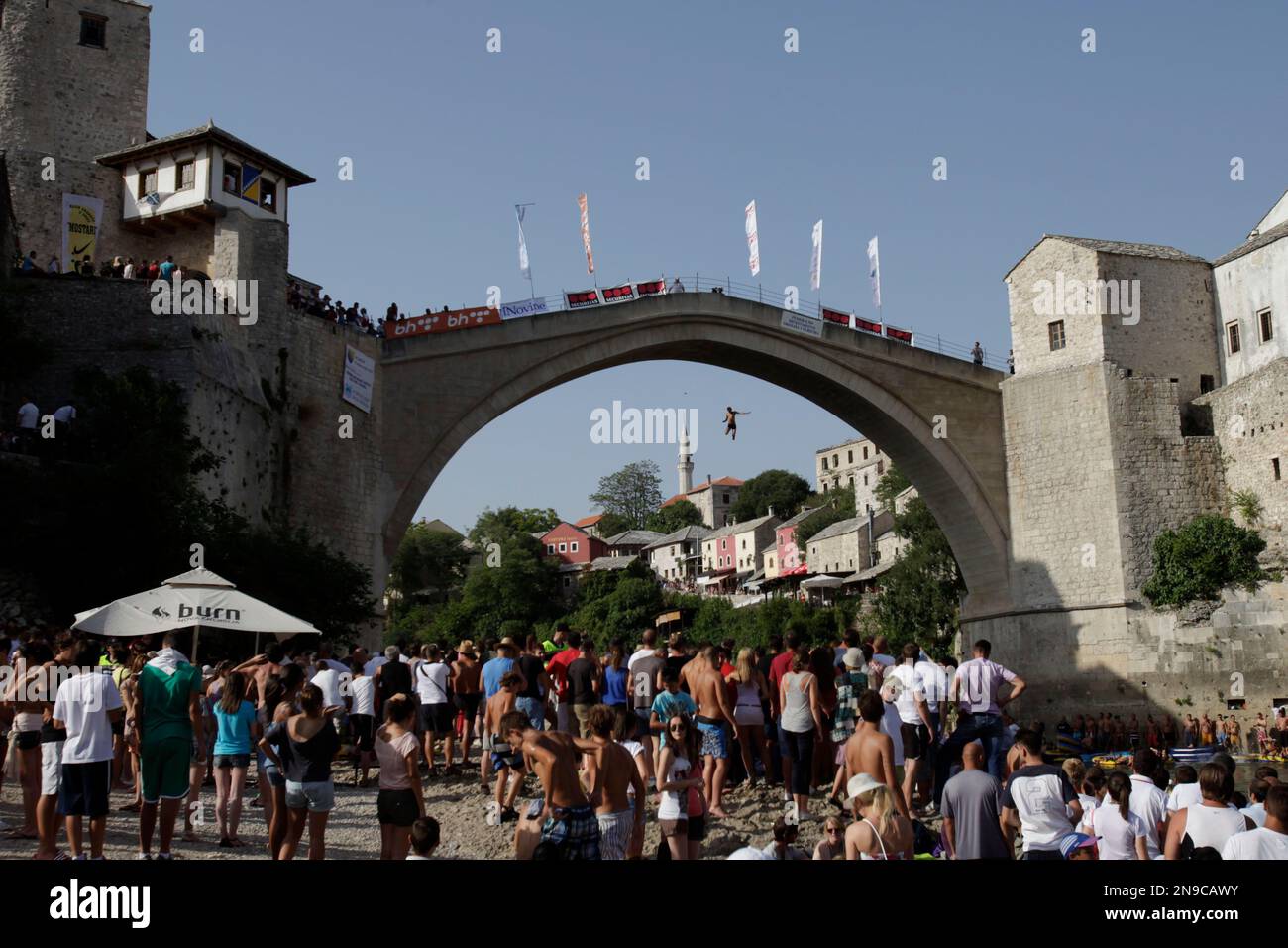 A diver drops from the Old Mostar Bridge, during 446th traditional ...
