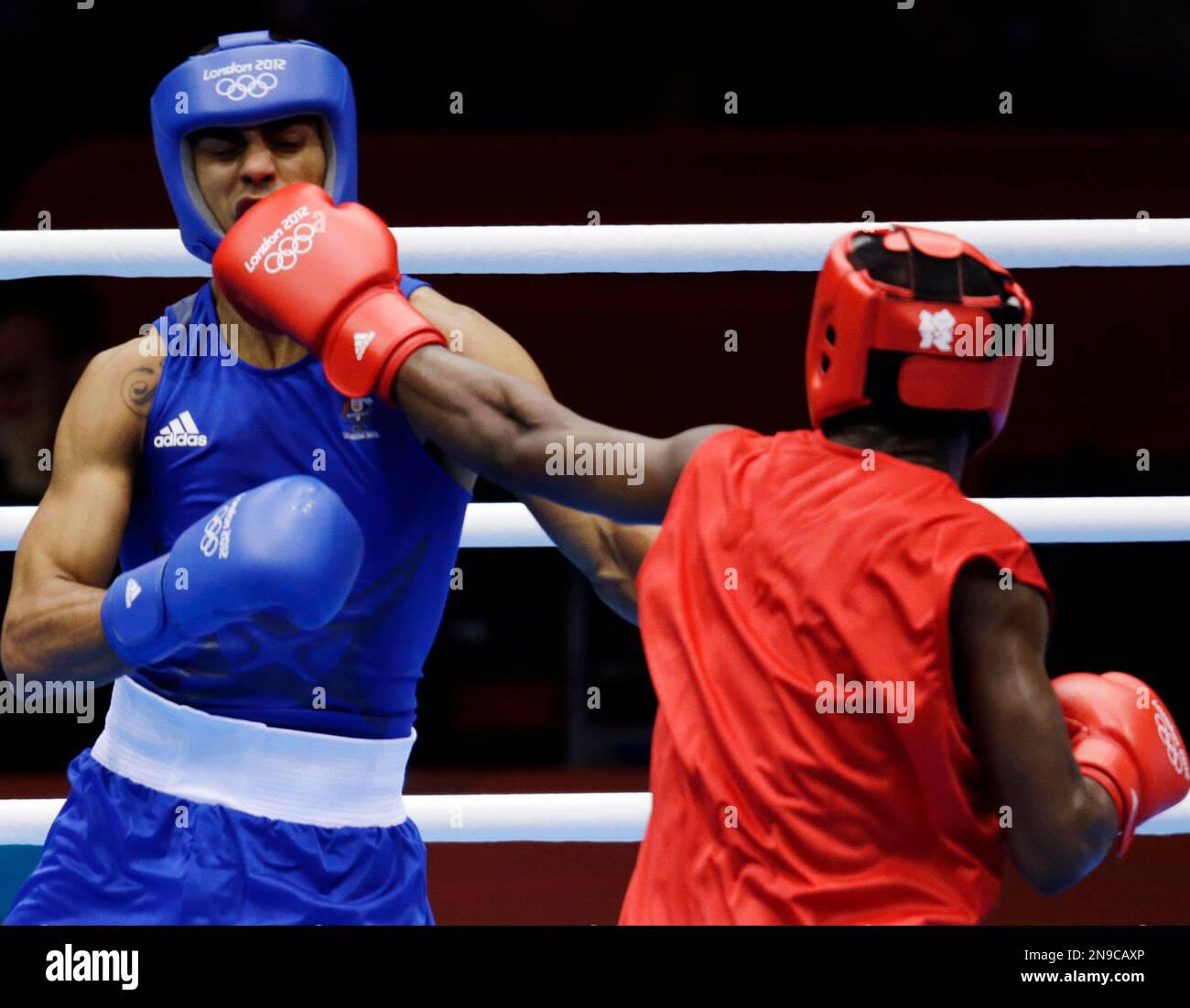 Nigeria's Moustapha Abdoulaye, right, connects against Australia's ...