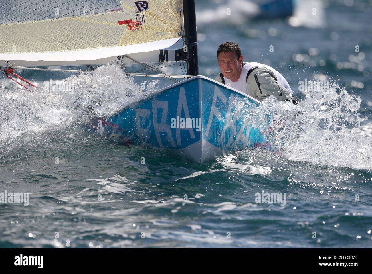 Jonathan Lobert of France sails to take the 4th place during the second ...
